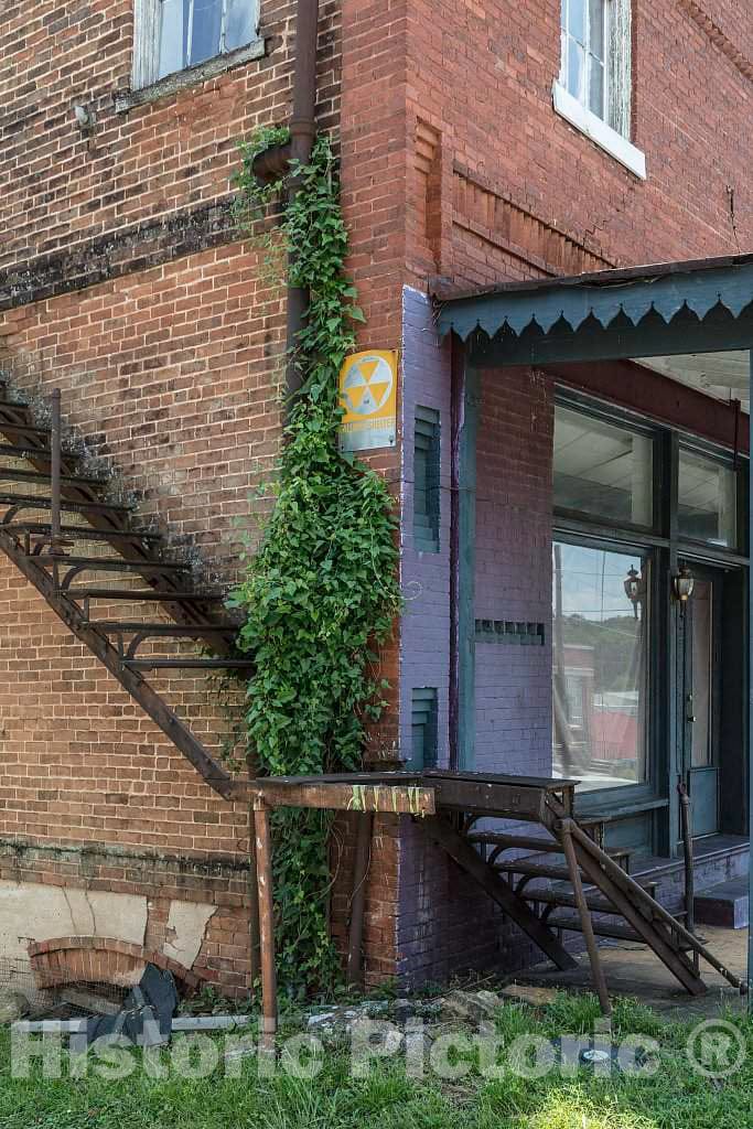 Photograph- At first glance, the rusted-out staircase leading from the ...